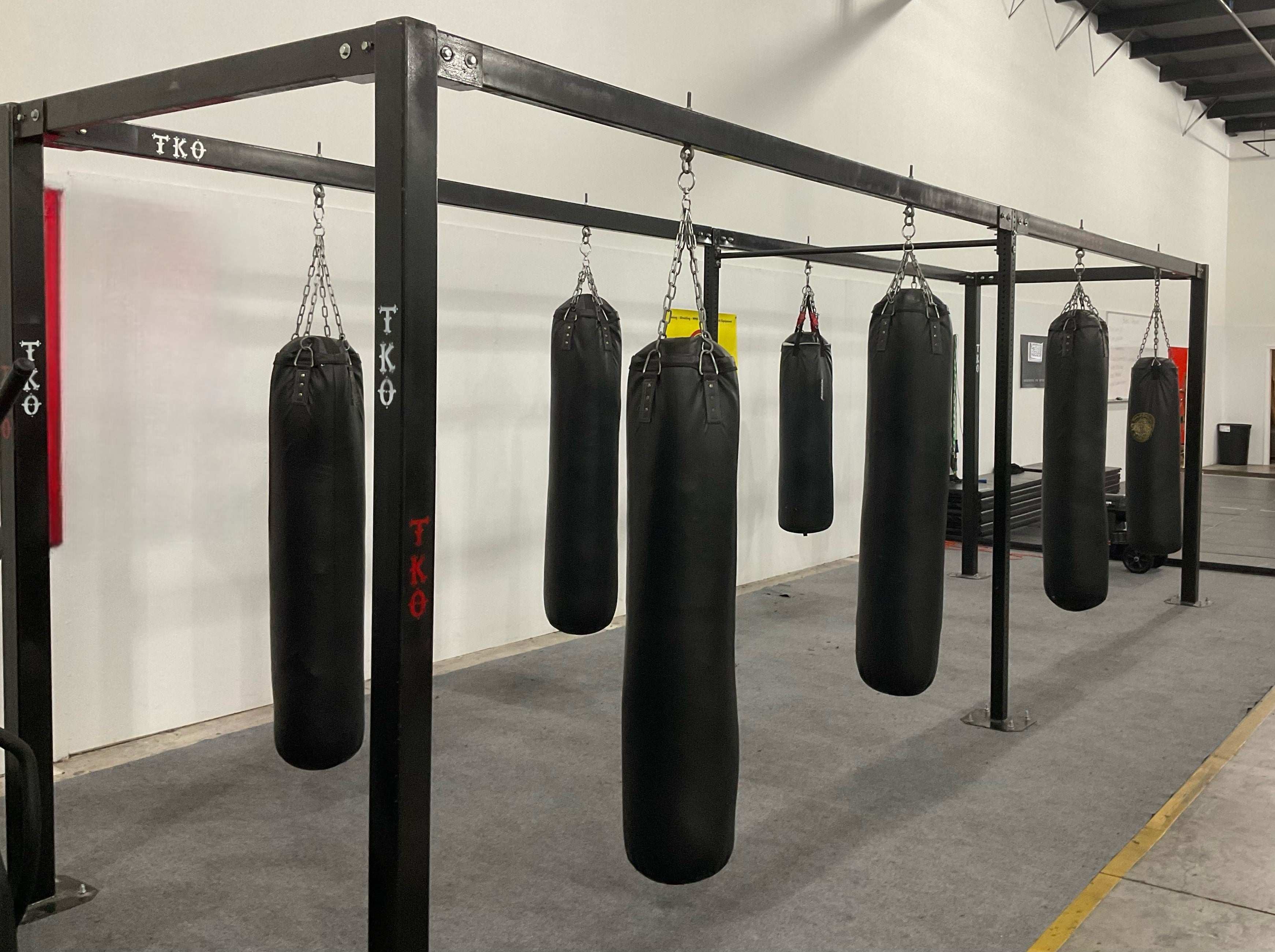 CUSTOM BUILT PUNCHING BAG RACKS - Monster Rings and Cages